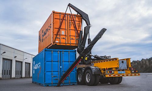 What is a side loader trailer and what can it be used for?